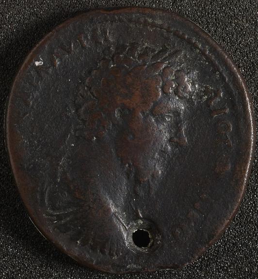 Perforated bronze cast of coin of Lucius Verus from Pergamum | Science ...