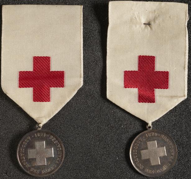 2 small circular medals with silk ribbons | Science Museum Group Collection