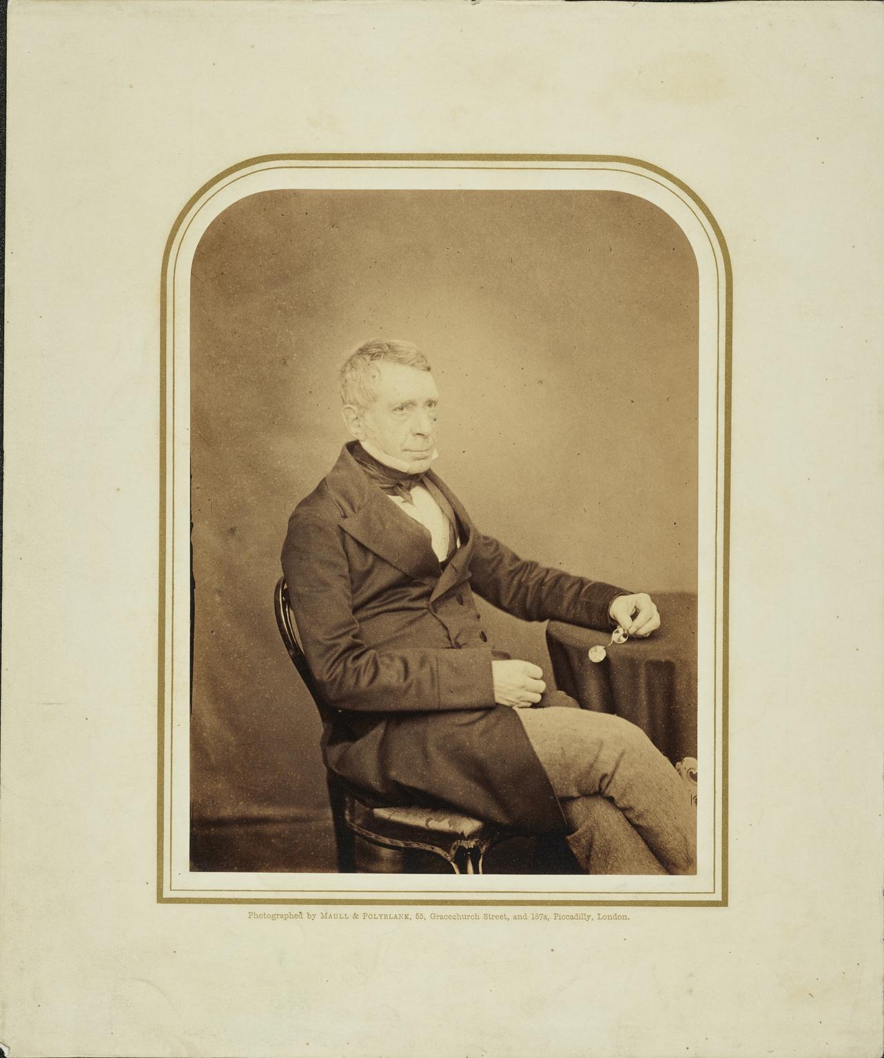 Two seated portrait photographs George Biddell Airy by Maull ...