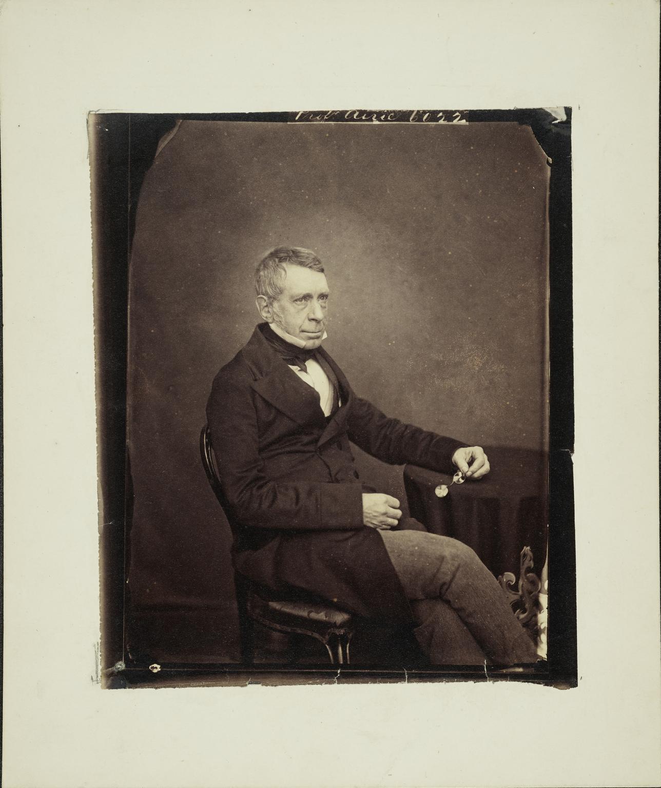 Two seated portrait photographs George Biddell Airy by Maull ...