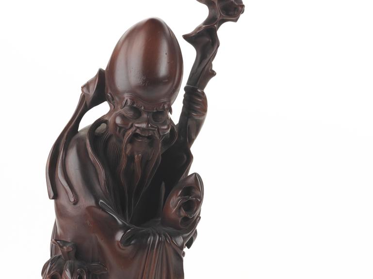 Statue depicting Shou Lao (Shou Xing), Chinese God of Longevity ...