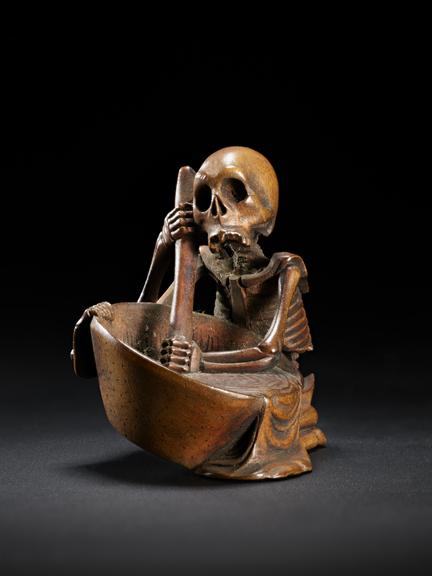 Netsuke in form of kneeling skeleton stirring a bowl | Science Museum ...