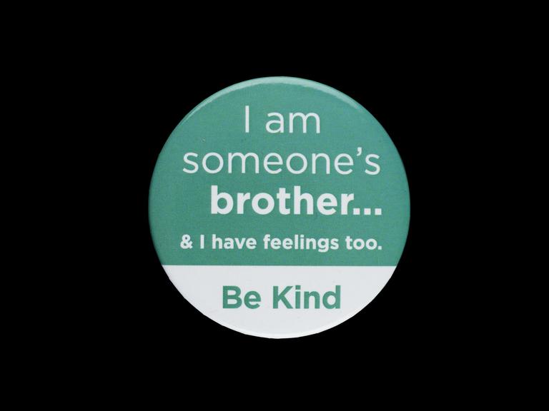 Badge with message ''I am someone's brother'' created by LNER as part ...